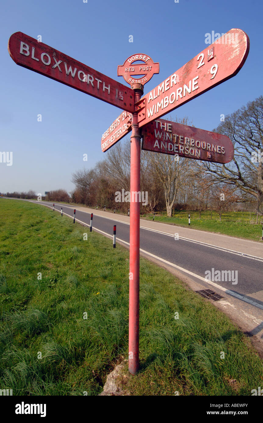 Red fingerpost in Dorset, Britain, UK Stock Photo - Alamy