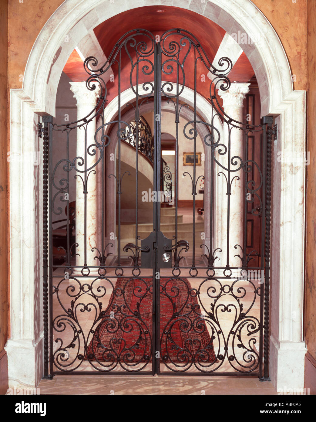 Iron work gate in residential estate Stock Photo - Alamy
