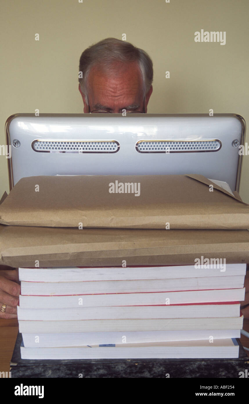 Working at computer Stock Photo - Alamy