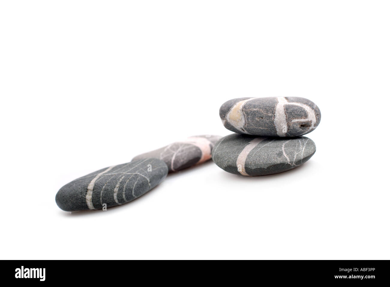 Worn pebble Cut Out Stock Images & Pictures - Alamy