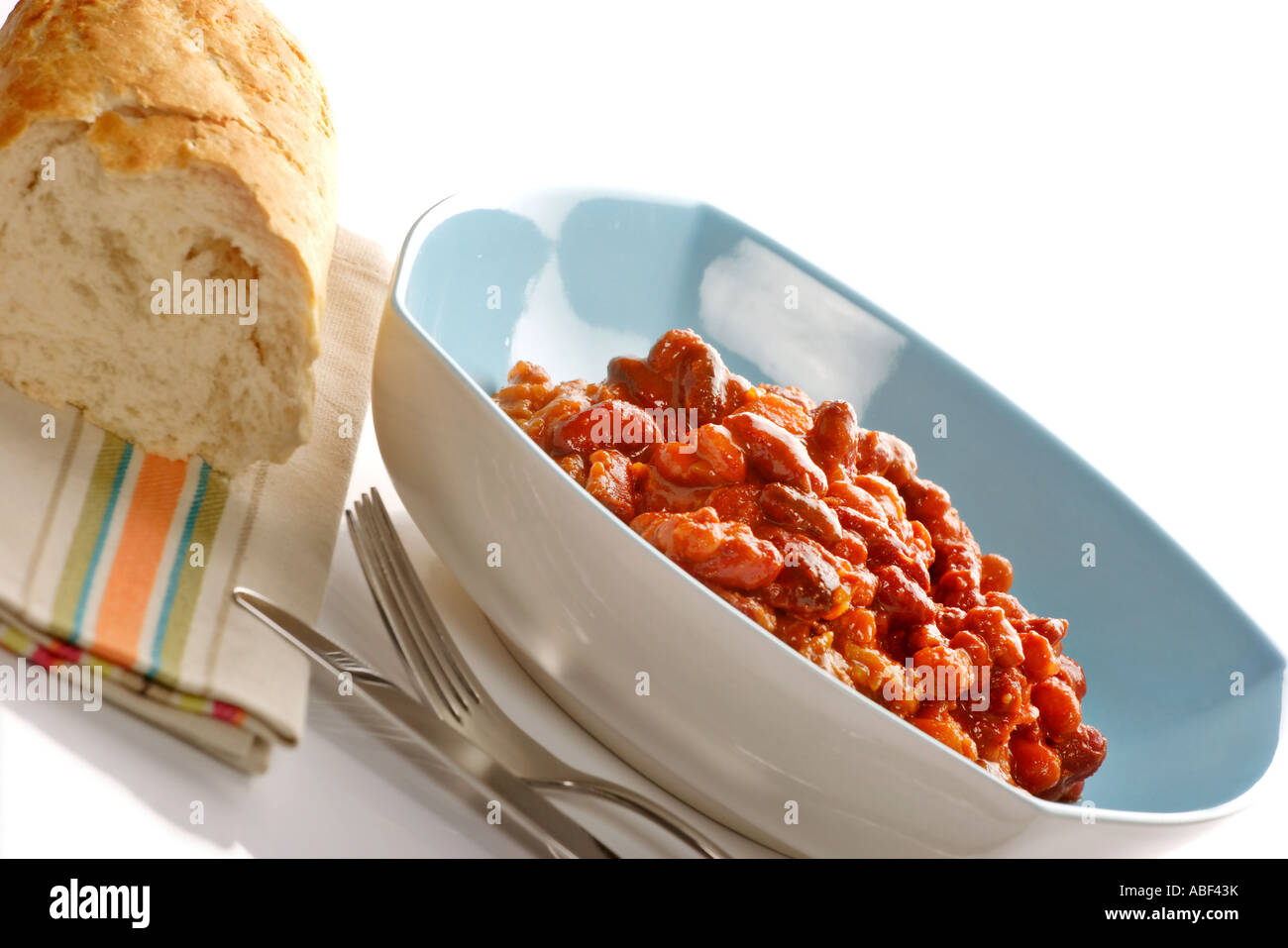 bowl of chilli with crusty farmhouse bread Stock Photo - Alamy