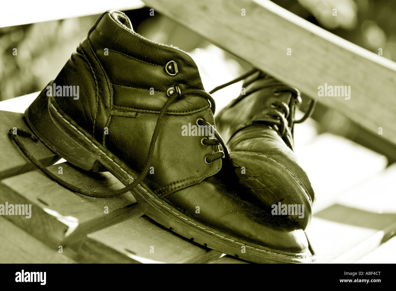 worn old boots Stock Photo - Alamy