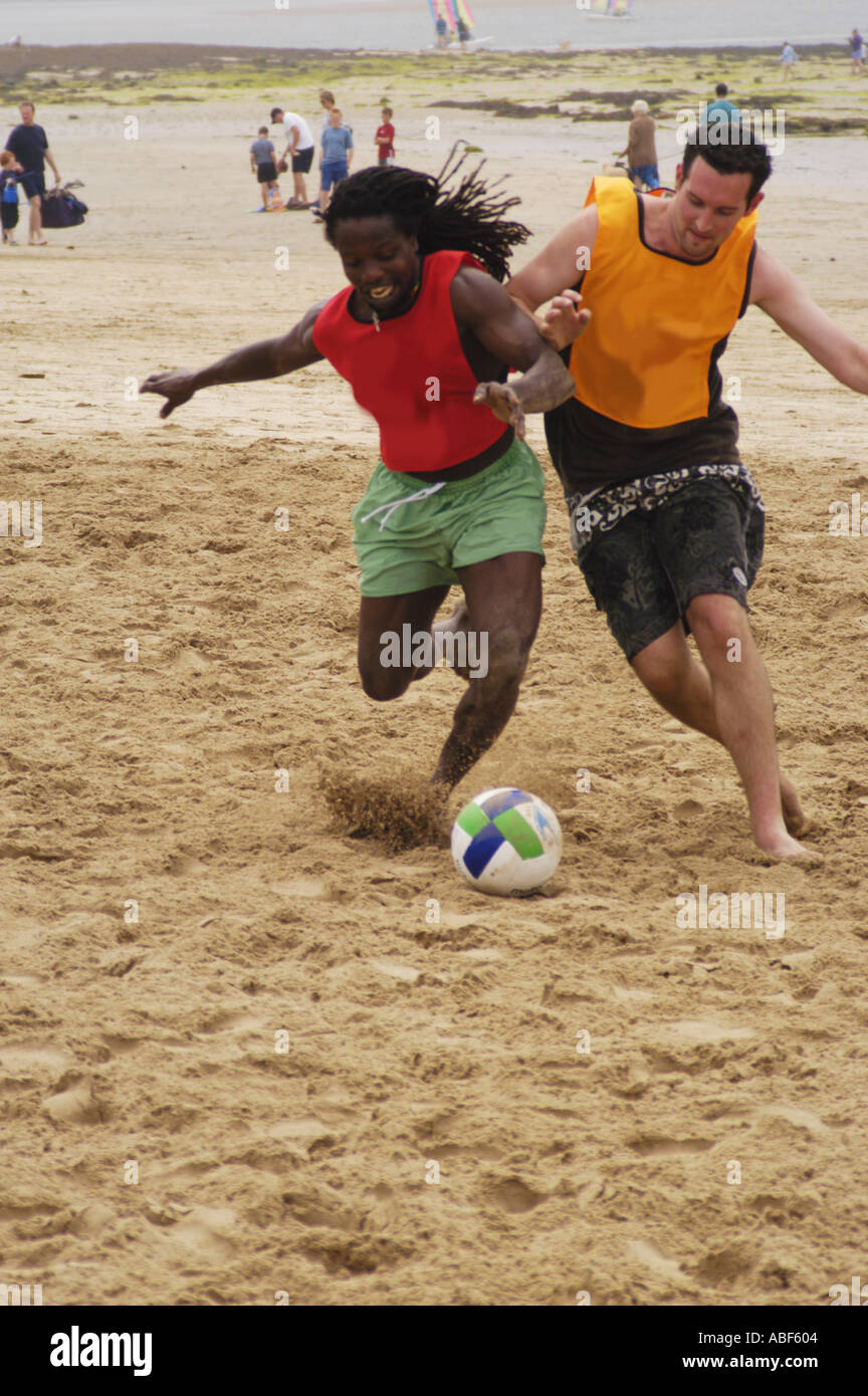 Football beach teenagers hi-res stock photography and images - Alamy