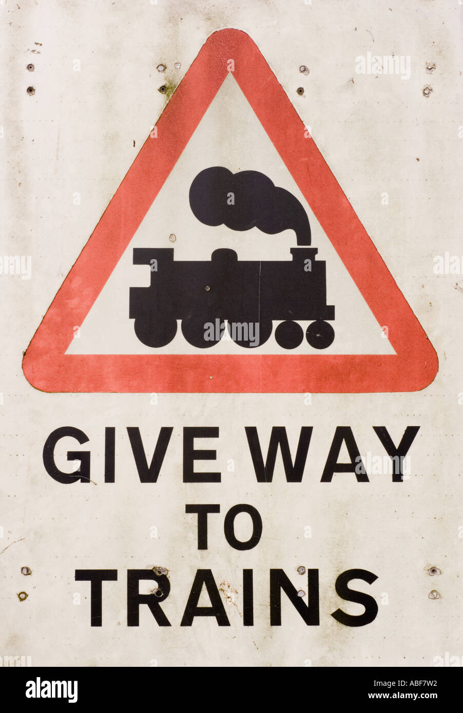 An old railway sign showing a steam train Stock Photo - Alamy