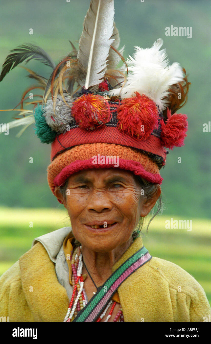 Filipino woman in traditional dress at the Banaue rice terraces in the ...