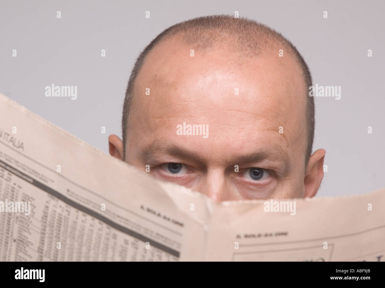 Man spy newspaper hi-res stock photography and images - Alamy