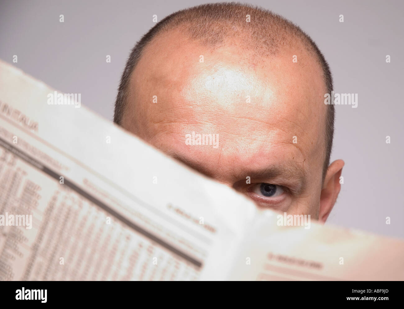 Man spy newspaper hi-res stock photography and images - Alamy