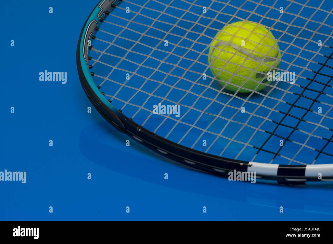 Tennis ball and racket Stock Photo - Alamy