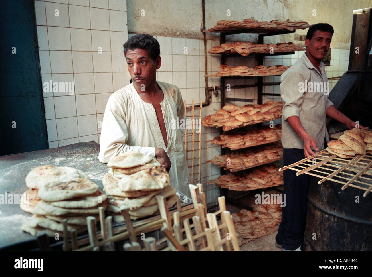 Workers inside a bakery Aswan Egypt Stock Photo - Alamy