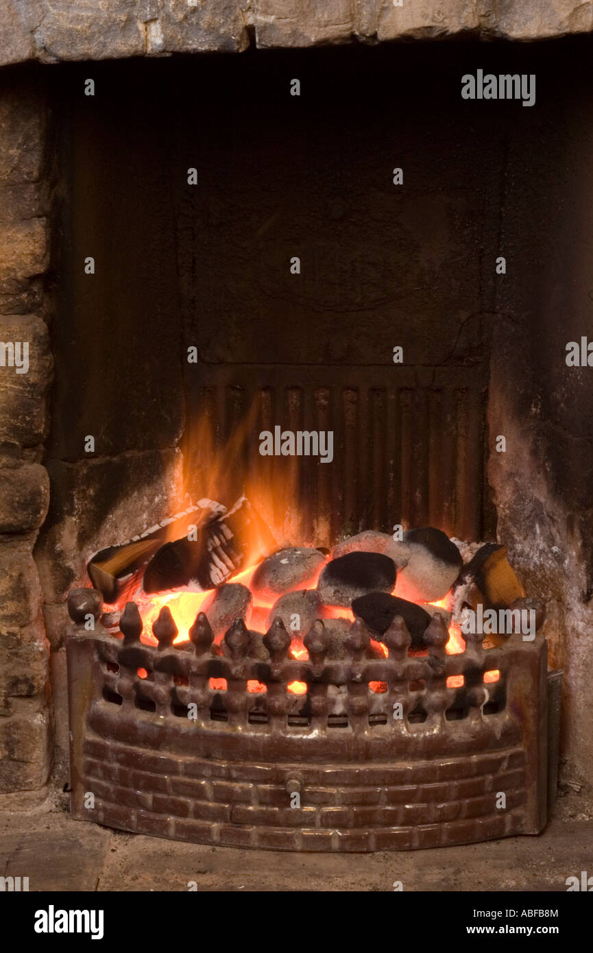 an open fireplace in a pub in the uk Stock Photo - Alamy