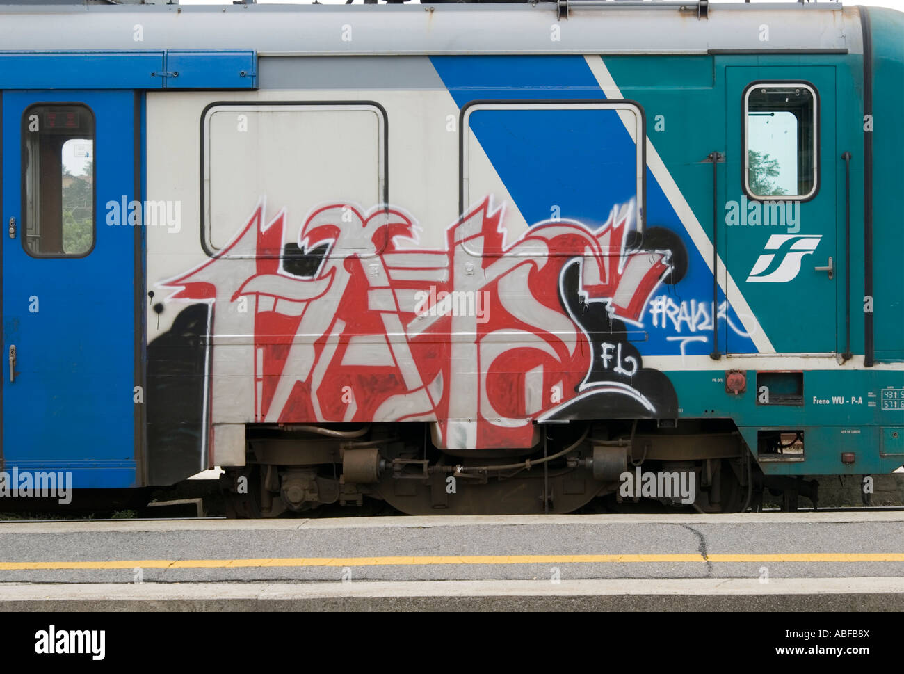 italian train Suburban EMU class 724 with graffiti all over the side ...