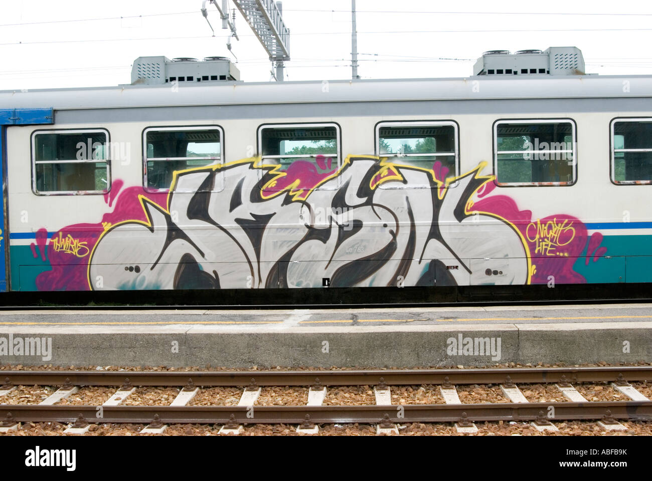 italian train Suburban EMU class 724 with graffiti all over the side ...