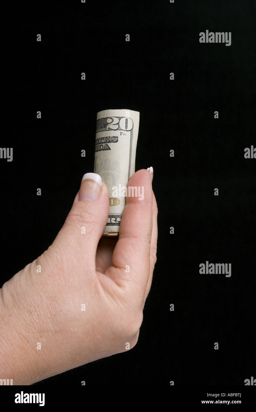 Roll 20 dollar bills hi-res stock photography and images - Alamy