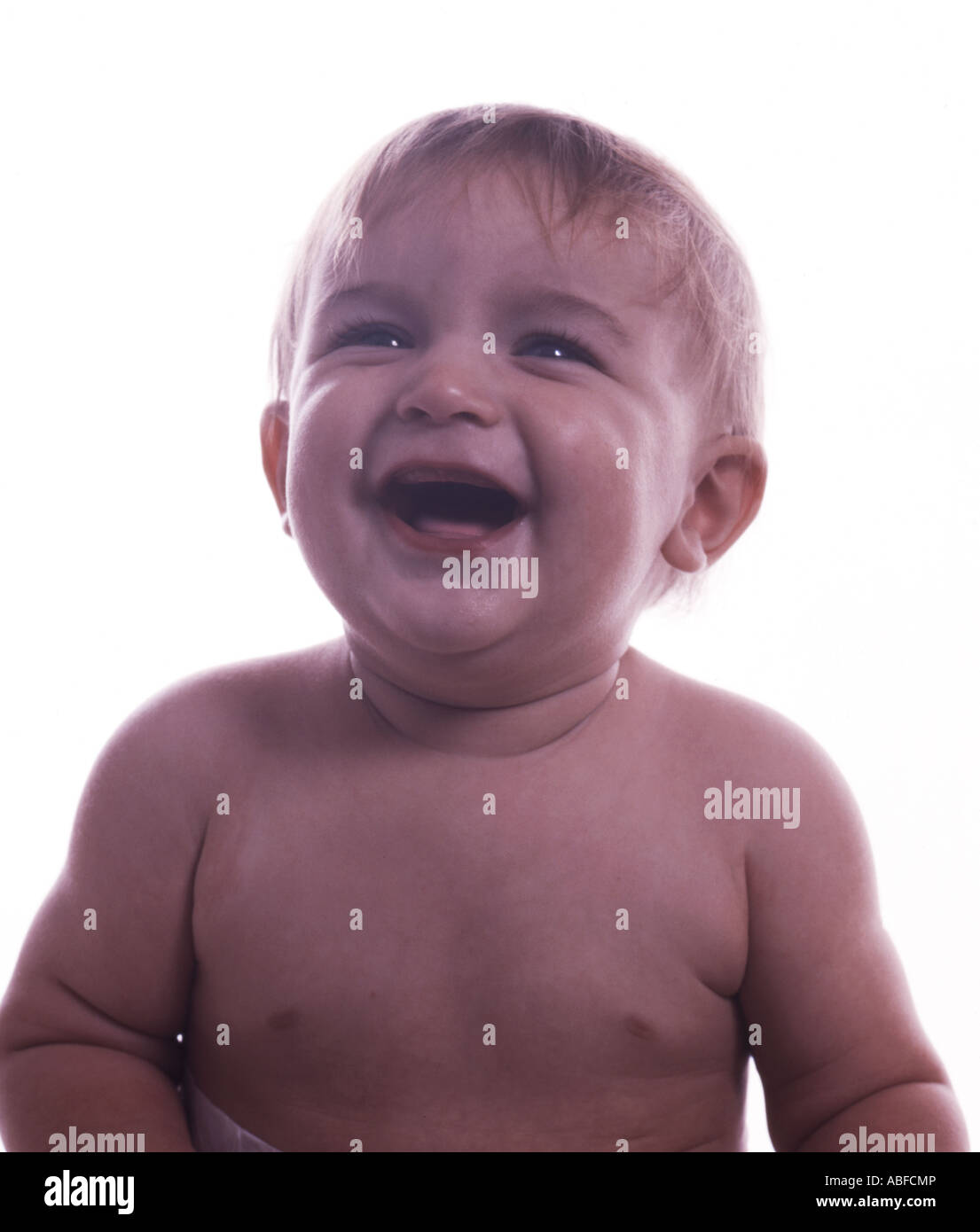 Young baby laughing model released Stock Photo - Alamy