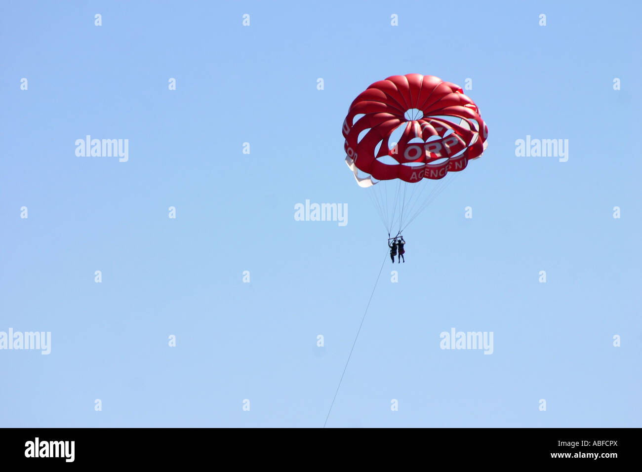 two people with a parachute, France Stock Photo - Alamy