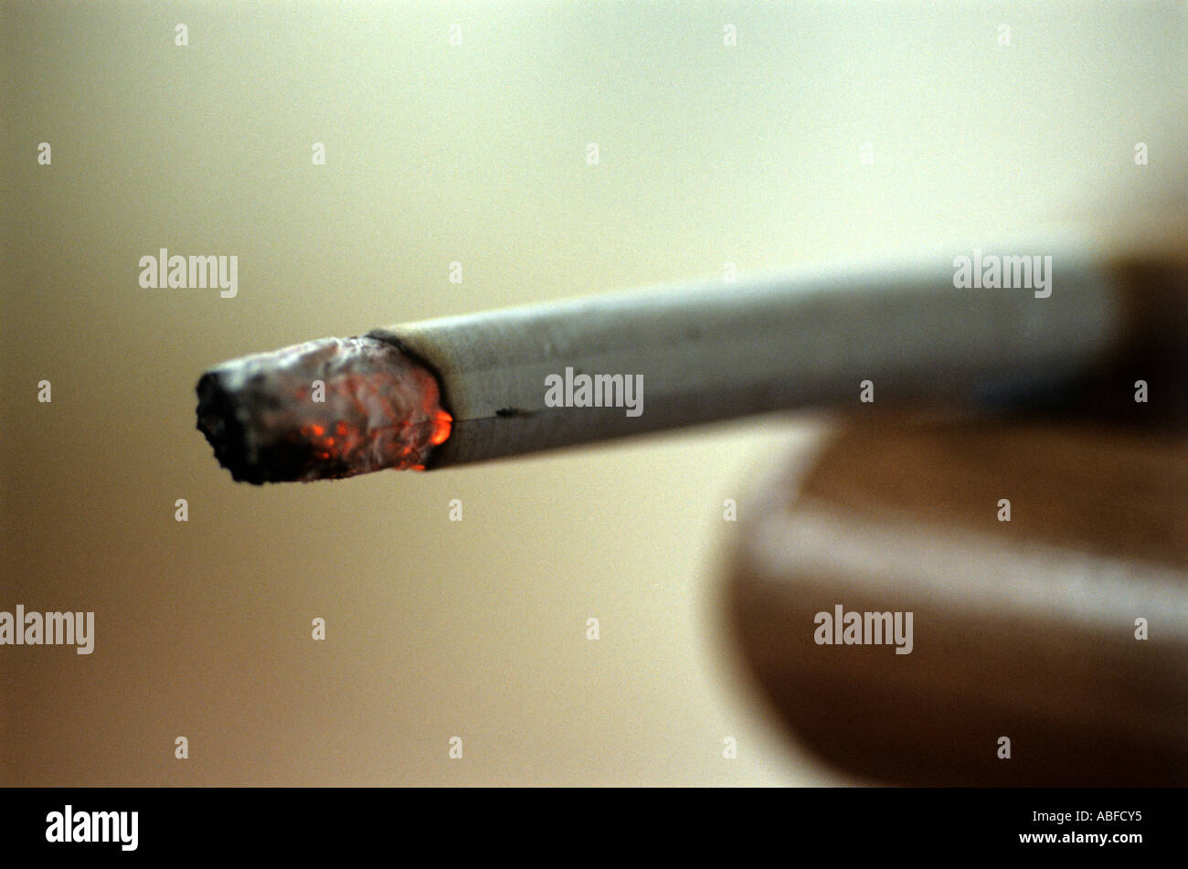 Lit cigarette hi-res stock photography and images - Alamy