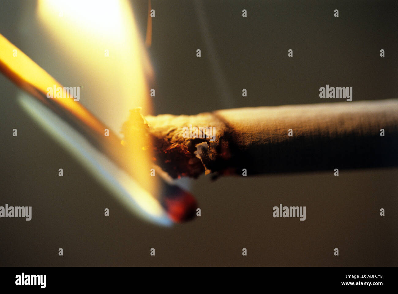 Lighting a Cigarette Stock Photo - Alamy
