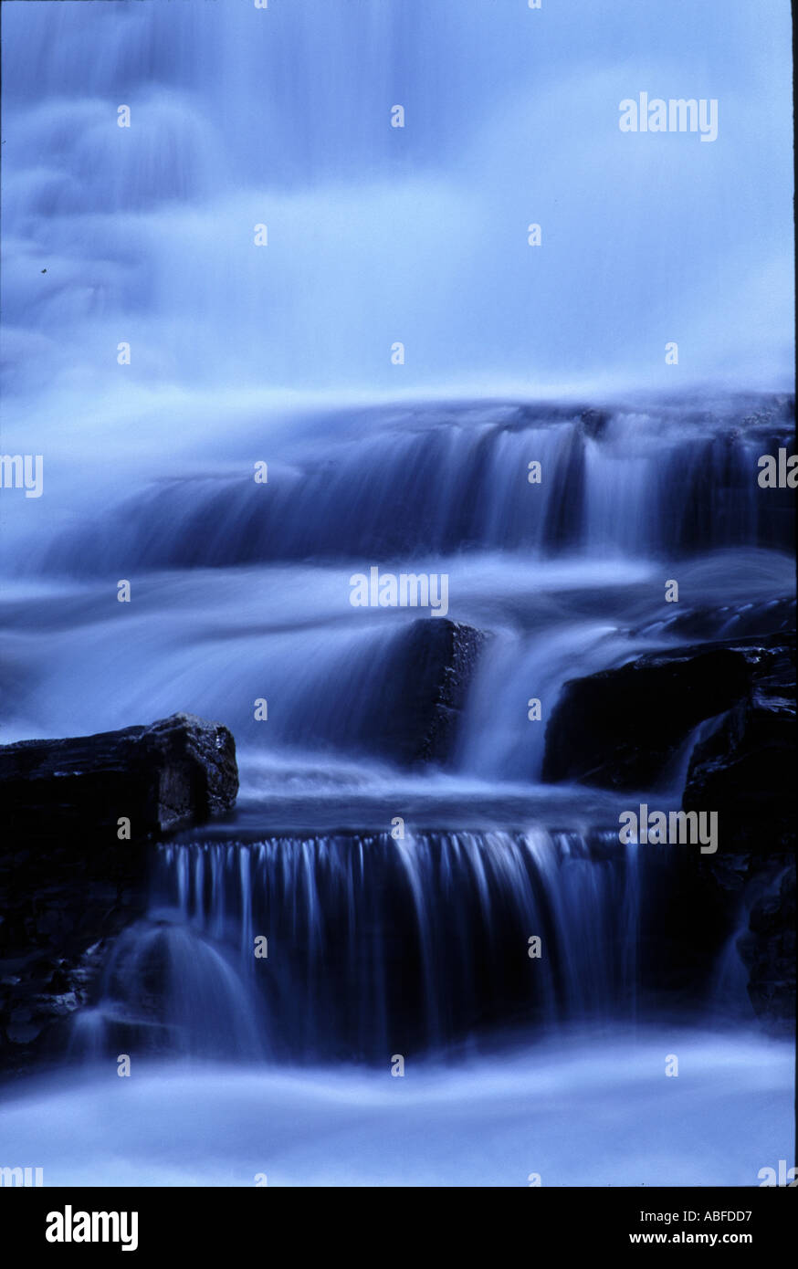 SACRED DANCING CASCADE GLACIER NATIONAL PARK MONTANA Stock Photo - Alamy