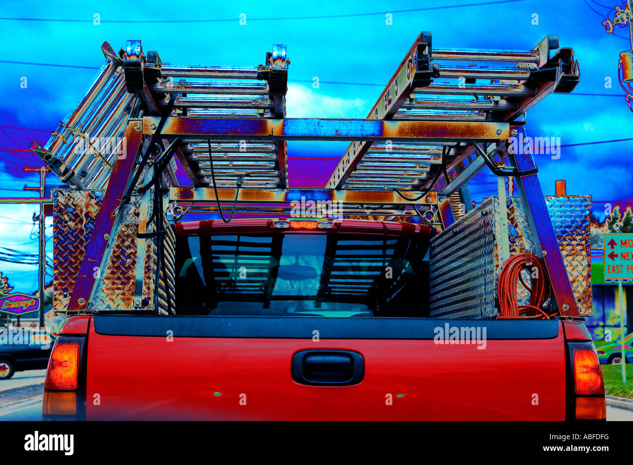 back of construction workers red pick up truck ladders Stock Photo - Alamy