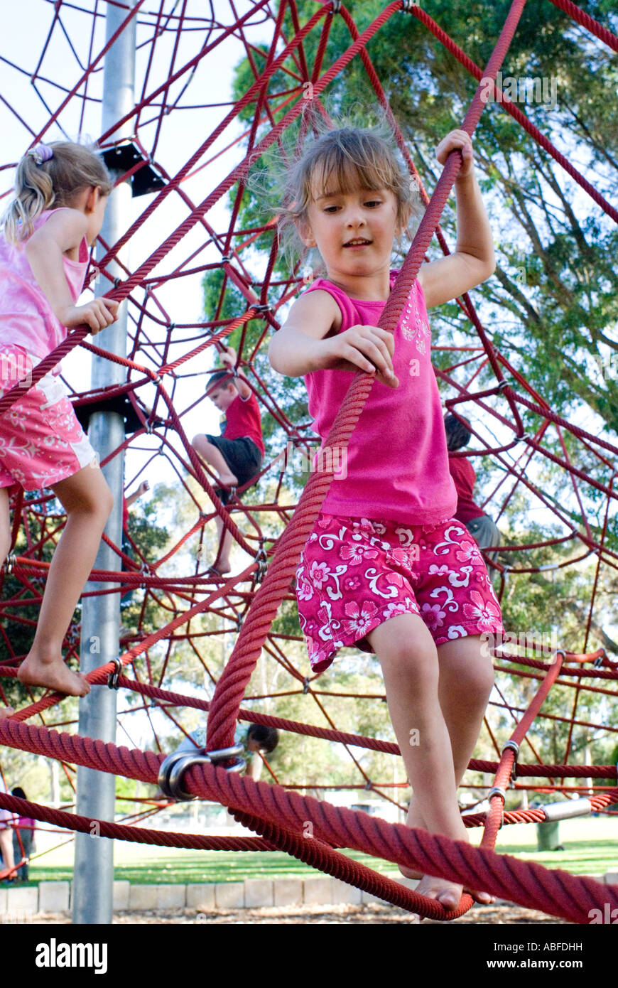 child playing on climbing ropes Stock Photo - Alamy