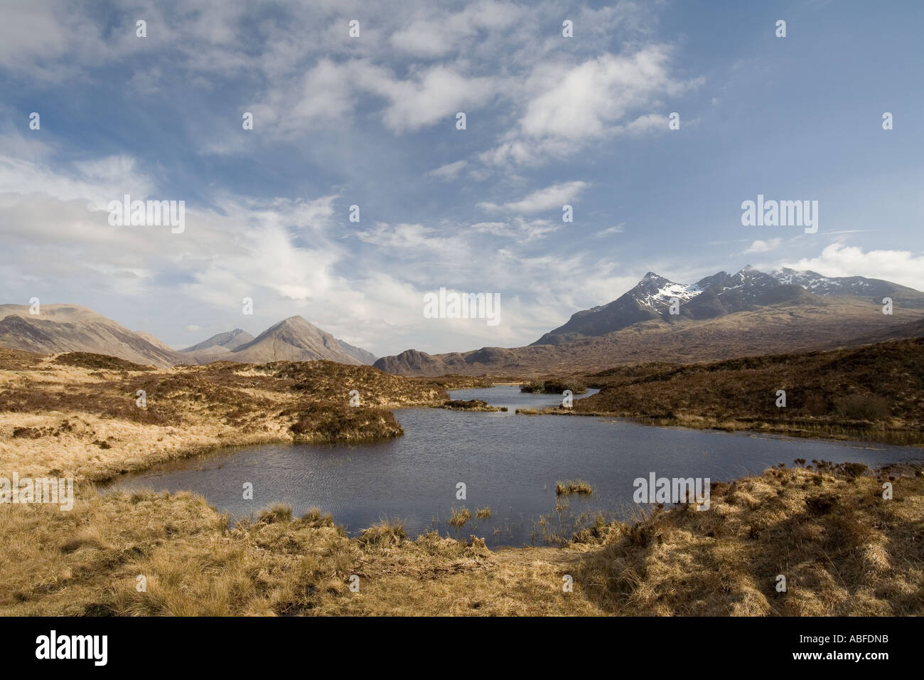 UK Scotland Isle of Skye Cuillin hills snow capped peak of Beinn Bhreac ...