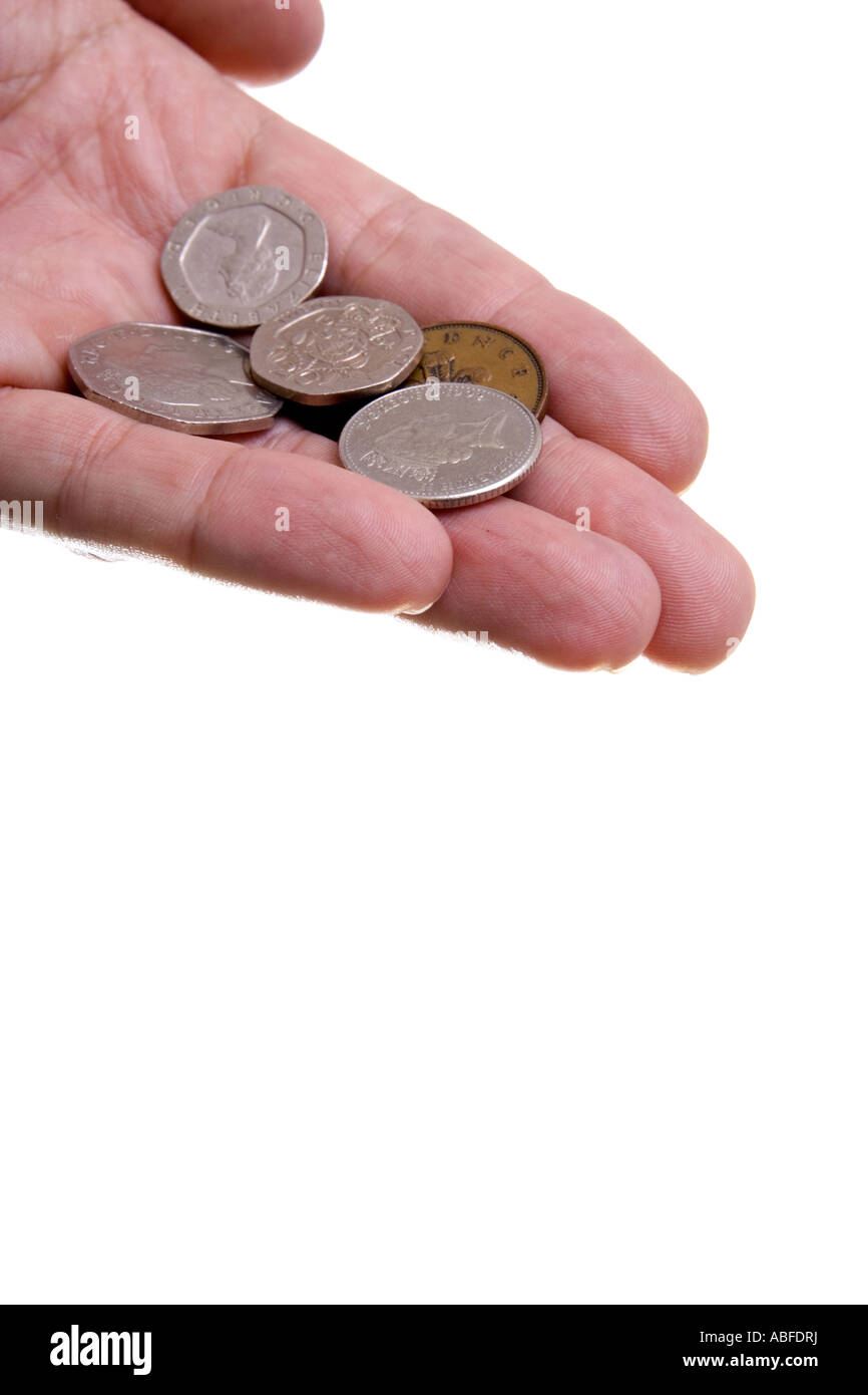 Coins in the palm of hand Stock Photo - Alamy