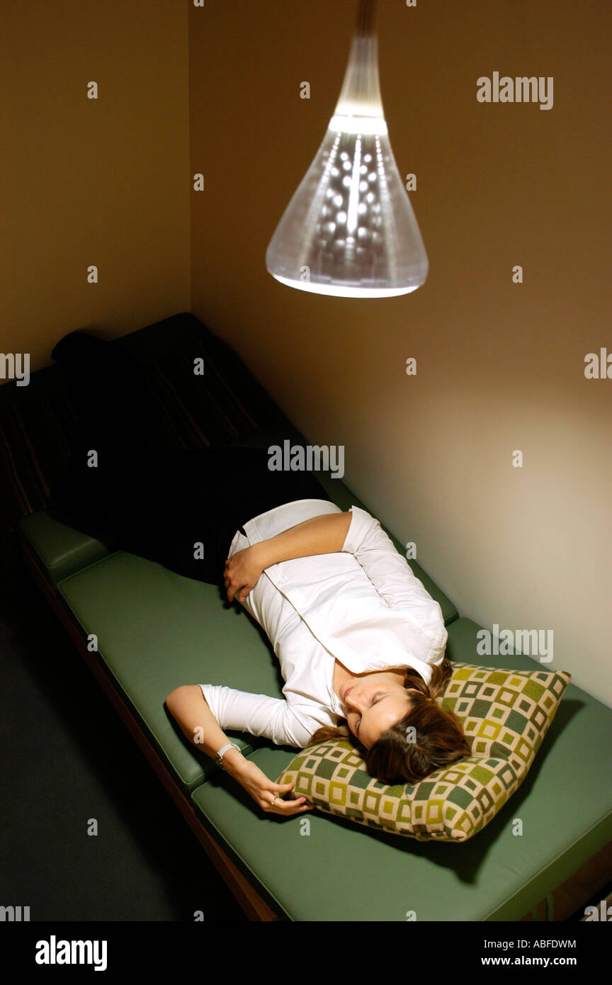 A woman takes an afternoon nap Stock Photo - Alamy
