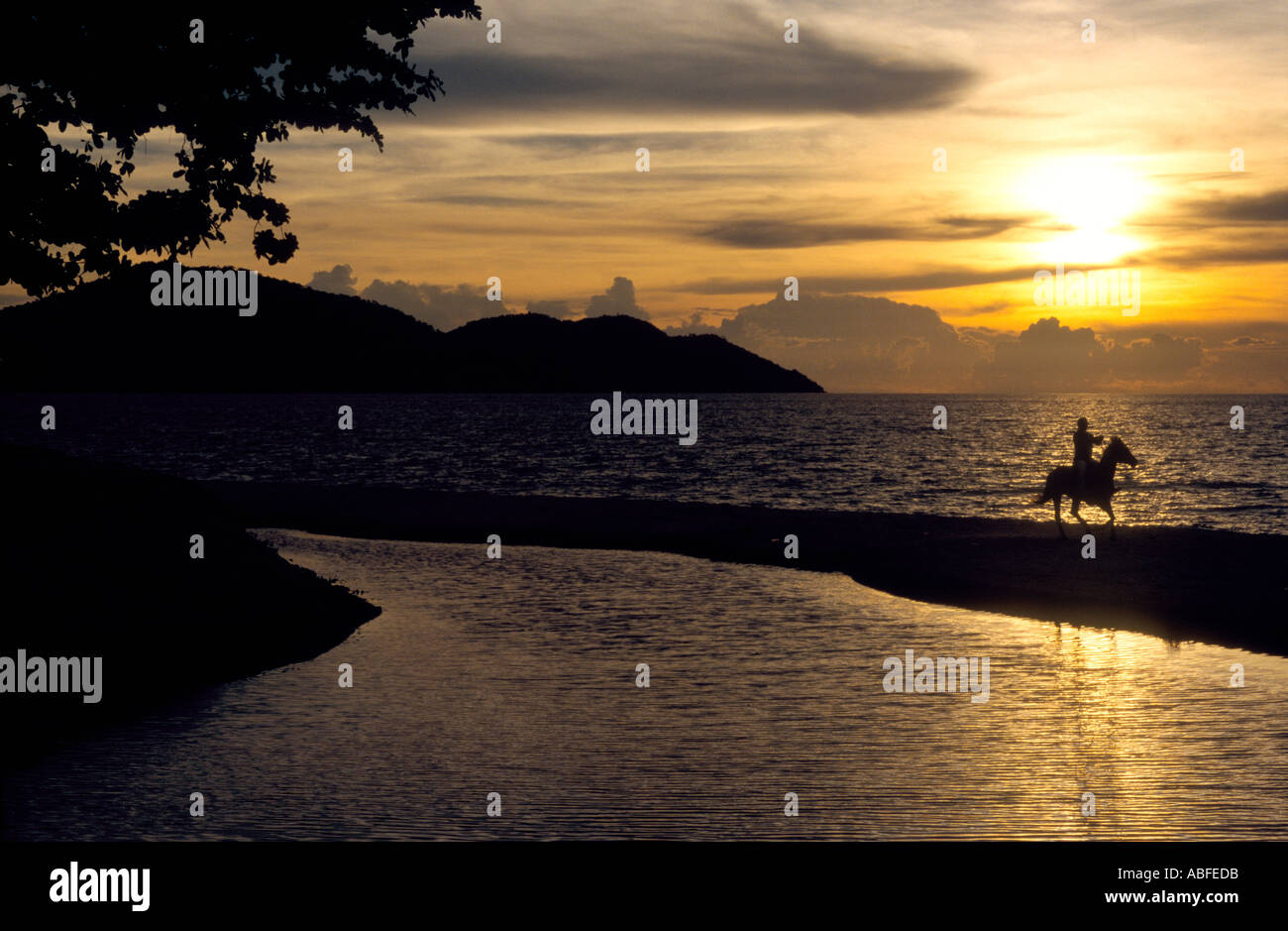 Ferenghi beach Penang Malaysia at sunset 3 Stock Photo - Alamy