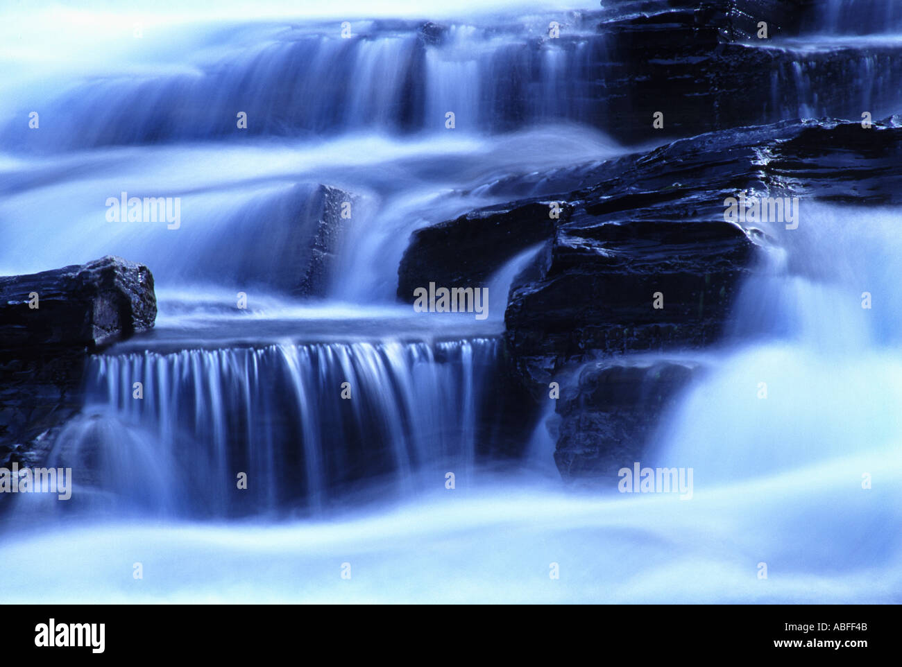 SACRED DANCING CASCADE GLACIER NATIONAL PARK MONTANA Stock Photo - Alamy