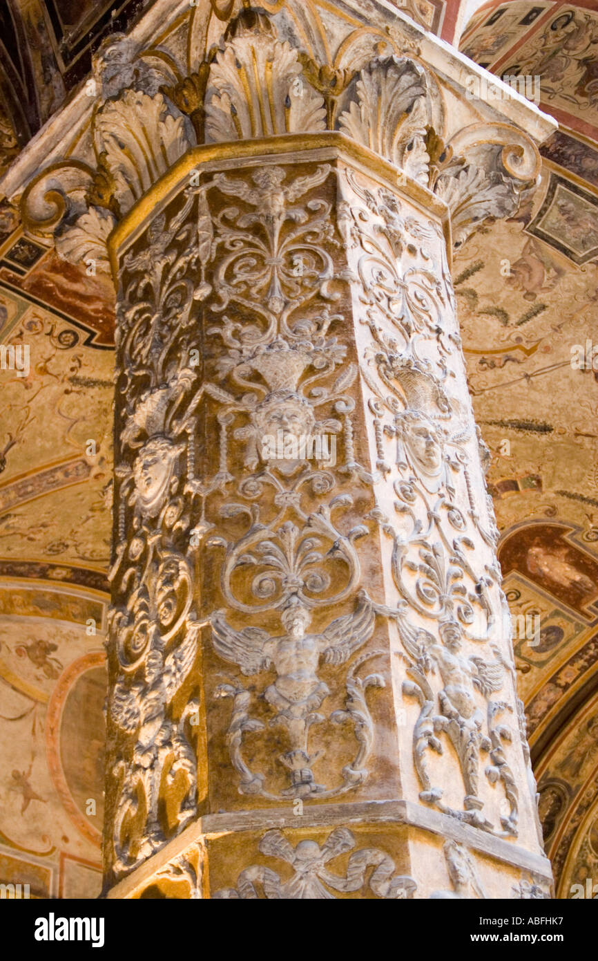 Close up of column with grotesque ornamentation in the courtyard of the ...