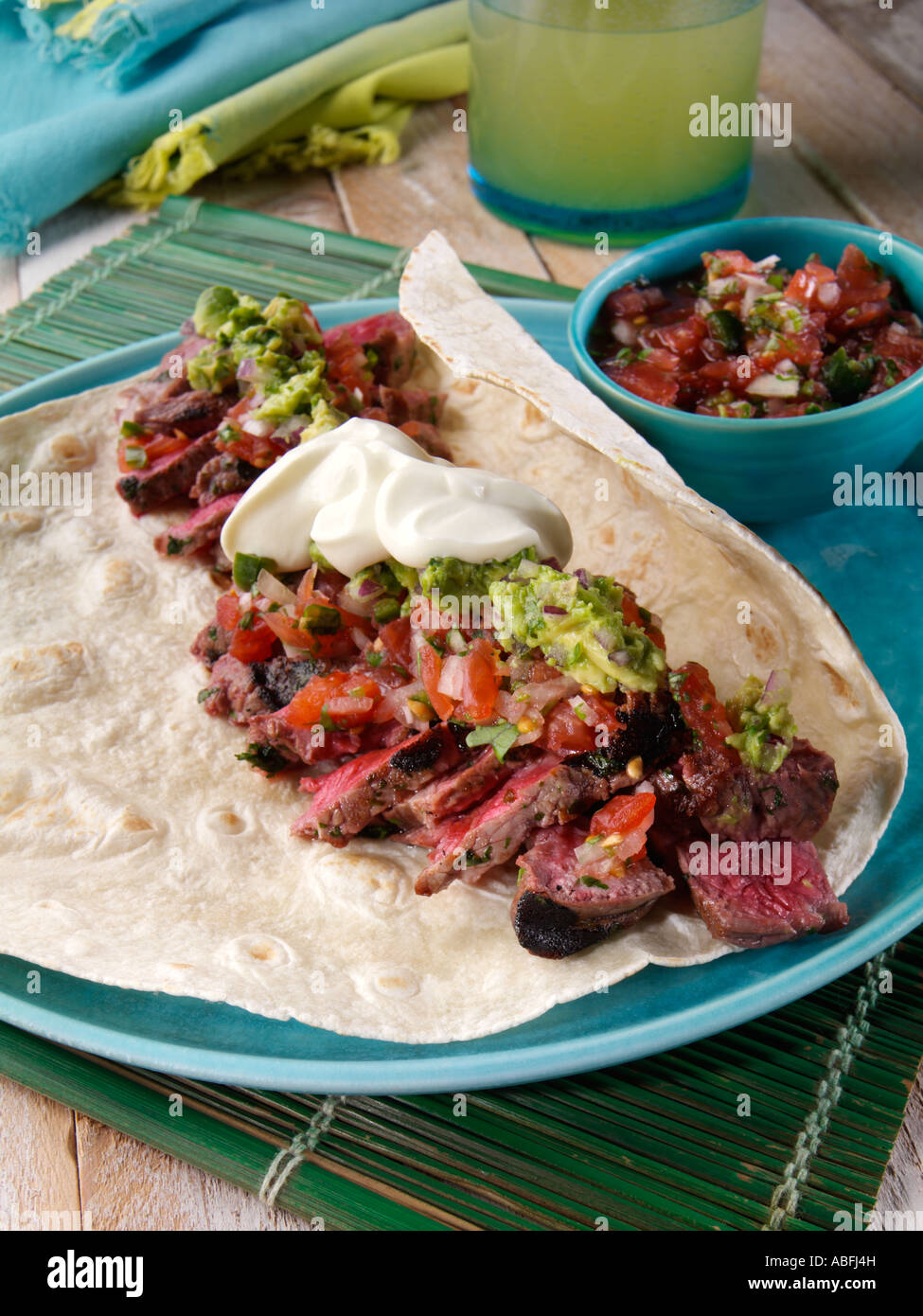 Individual tex mex spicy beef guacamole onion fajita tortilla wrap hi ...