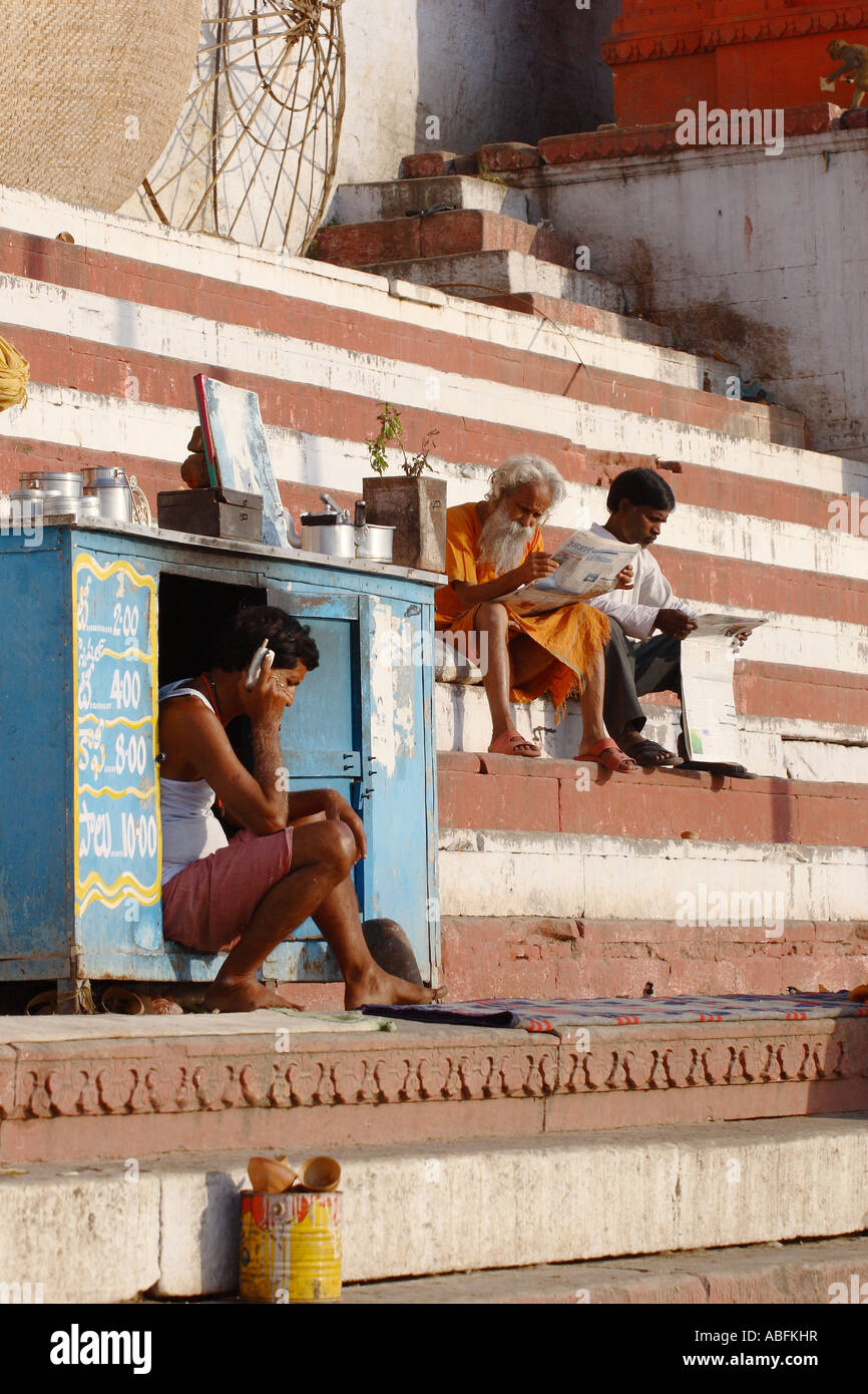 Chai Wallah and men on the Ghats in the early morning, Varanasi, India ...