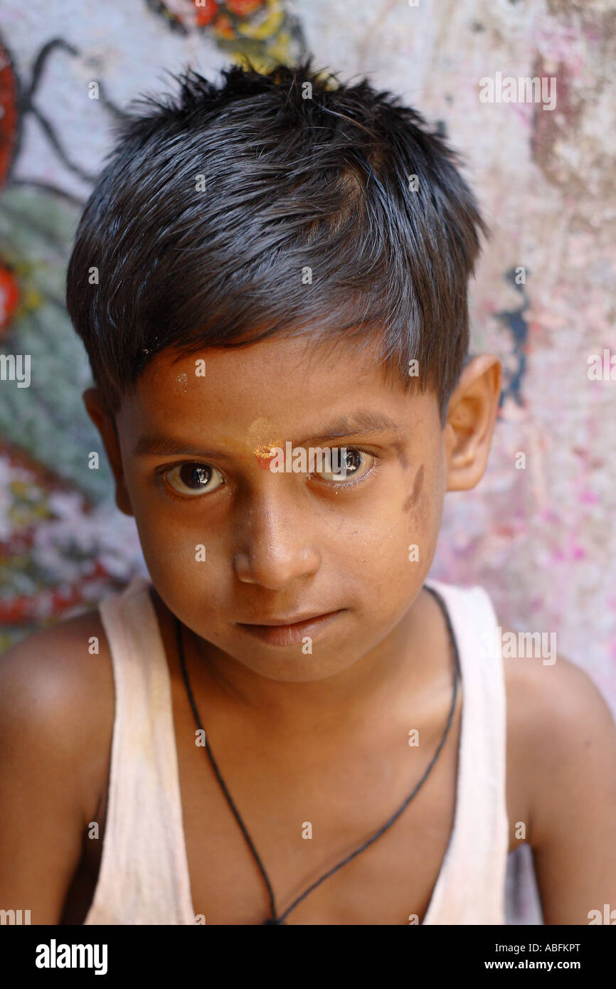 Portrait of a young Hindu boy on the streets of Varanasi Stock Photo ...