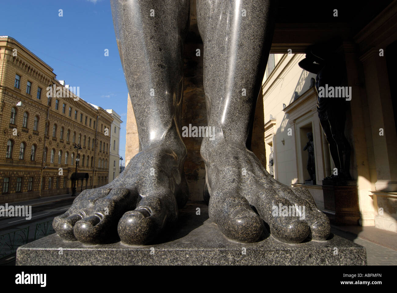 Feet of Atlas statue in monumental portico outside New Hermitage, St ...