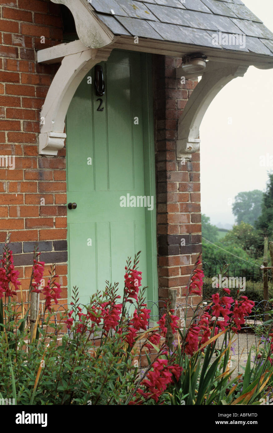Green Cottage Door Stock Photo - Alamy