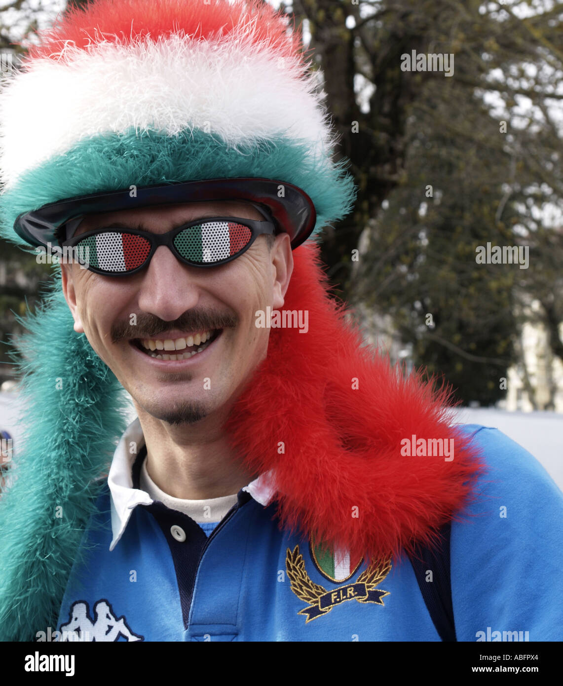 Italian rugby fan with red white and green hat and glasses Stock Photo ...