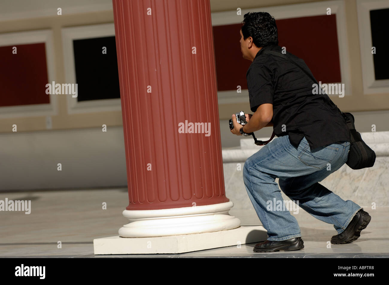 Photographer shooting the columns outside the galleries main entrance ...
