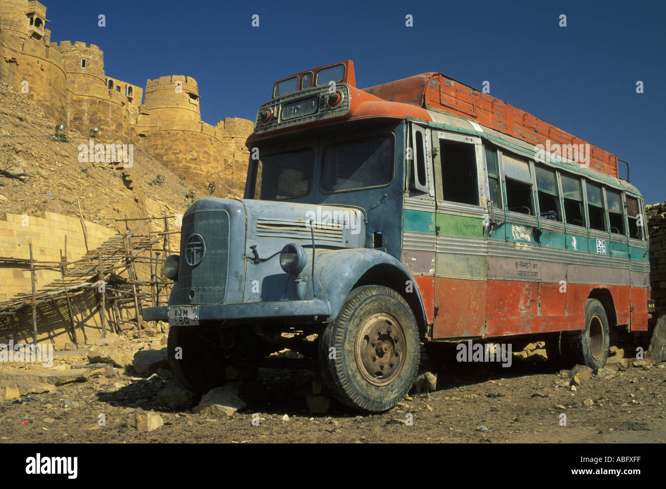 Old bus parked outside the ancient walls of the fort at Jaisalmer ...