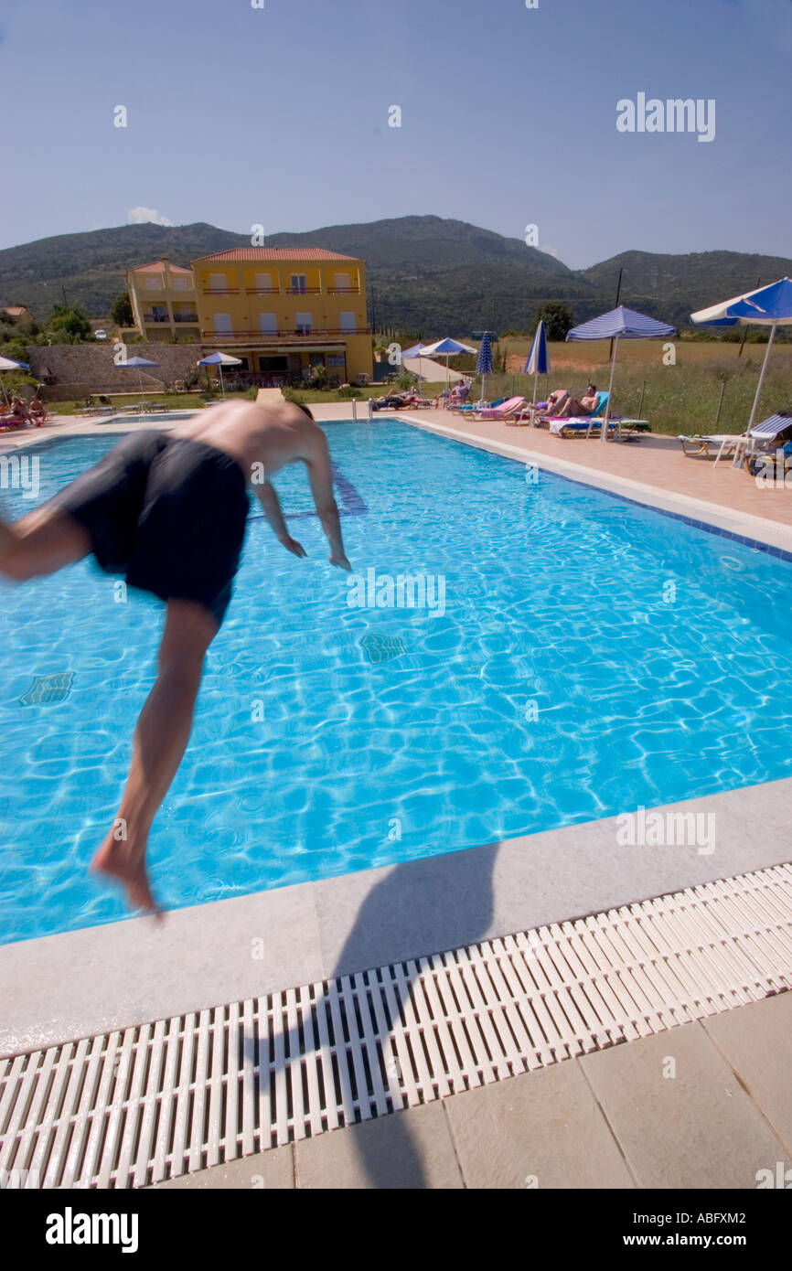Man Diving into Swimming pool Stock Photo - Alamy