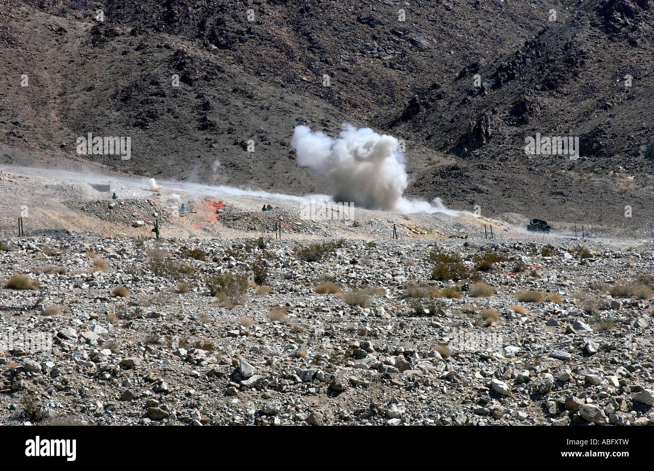 A round from an AT-4 small rocket launcher impacts on Range 400 Stock ...