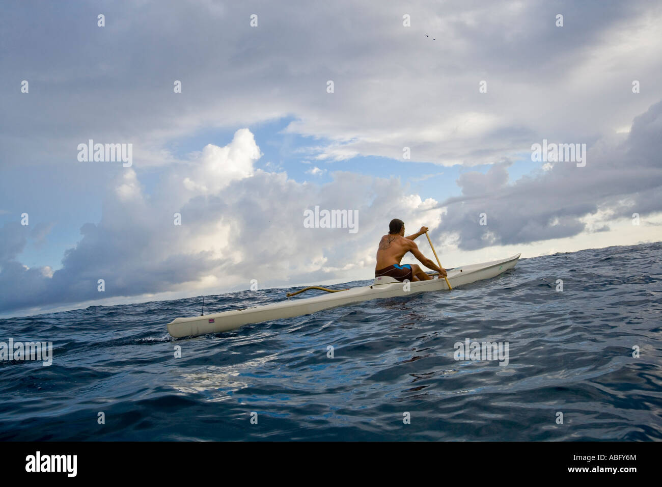 One man canoe paddler near Makapuu at sunrise Manana Island in ...