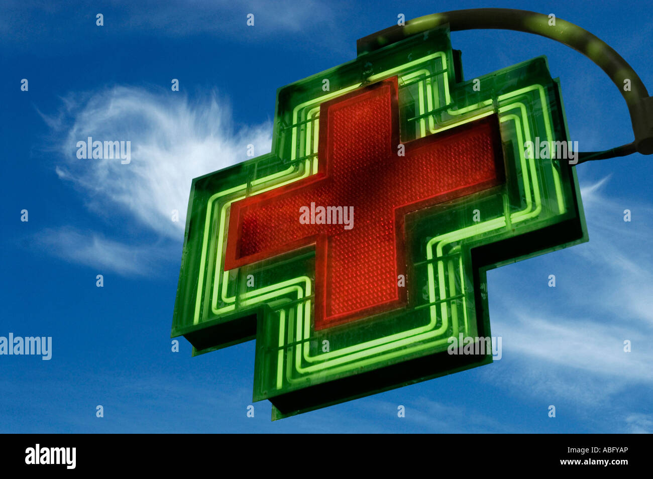 Pharmacy neon green cross sign hi-res stock photography and images - Alamy