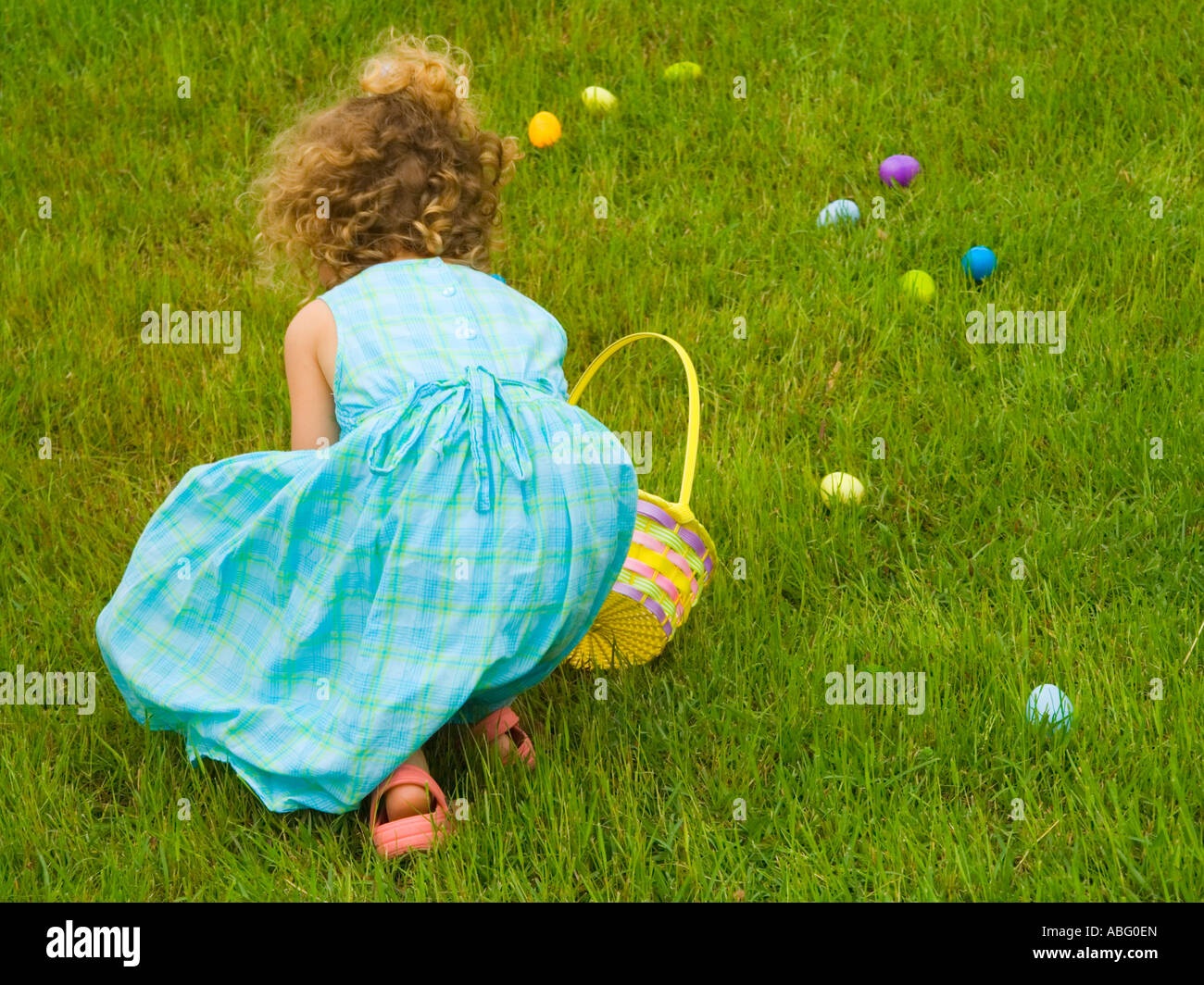 Child on easter egg hunt Stock Photo - Alamy
