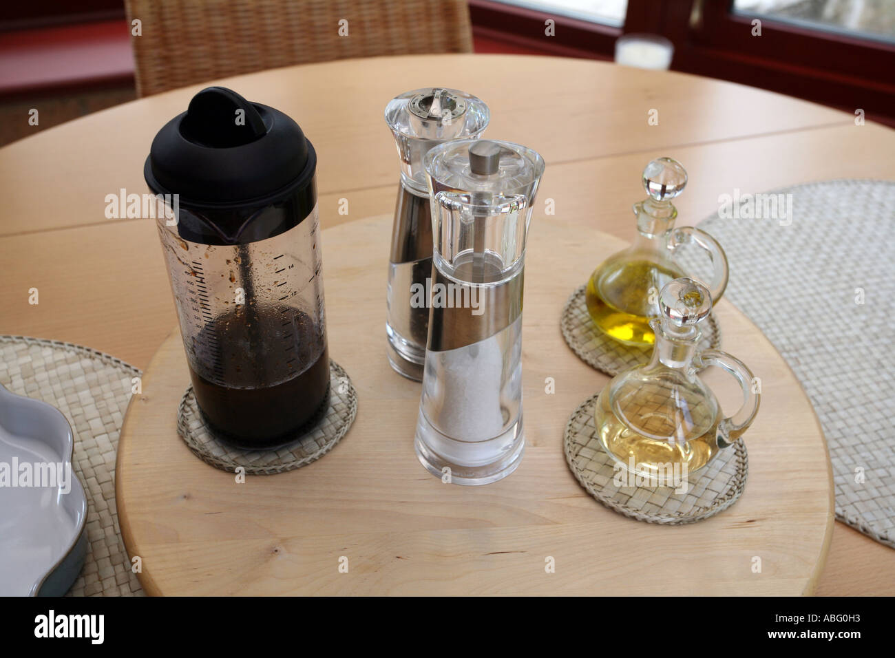 Various condiments with salt and pepper grinders Stock Photo - Alamy