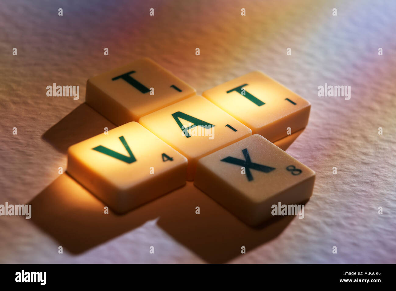 SCRABBLE BOARD GAME LETTERS SPELLING THE WORDS TAX VAT Stock Photo - Alamy