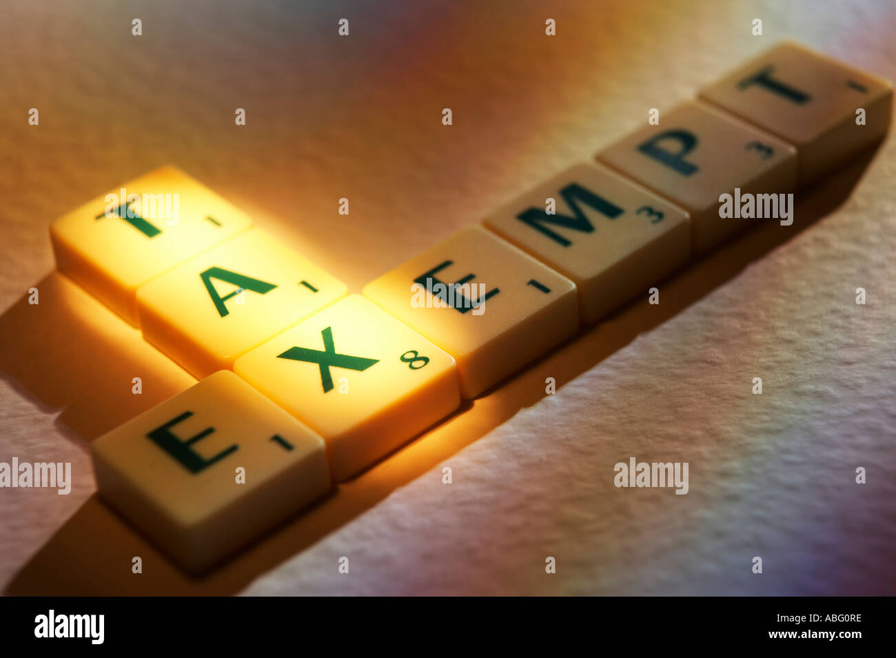 SCRABBLE BOARD GAME LETTERS SPELLING THE WORDS TAX EXEMPT Stock Photo ...