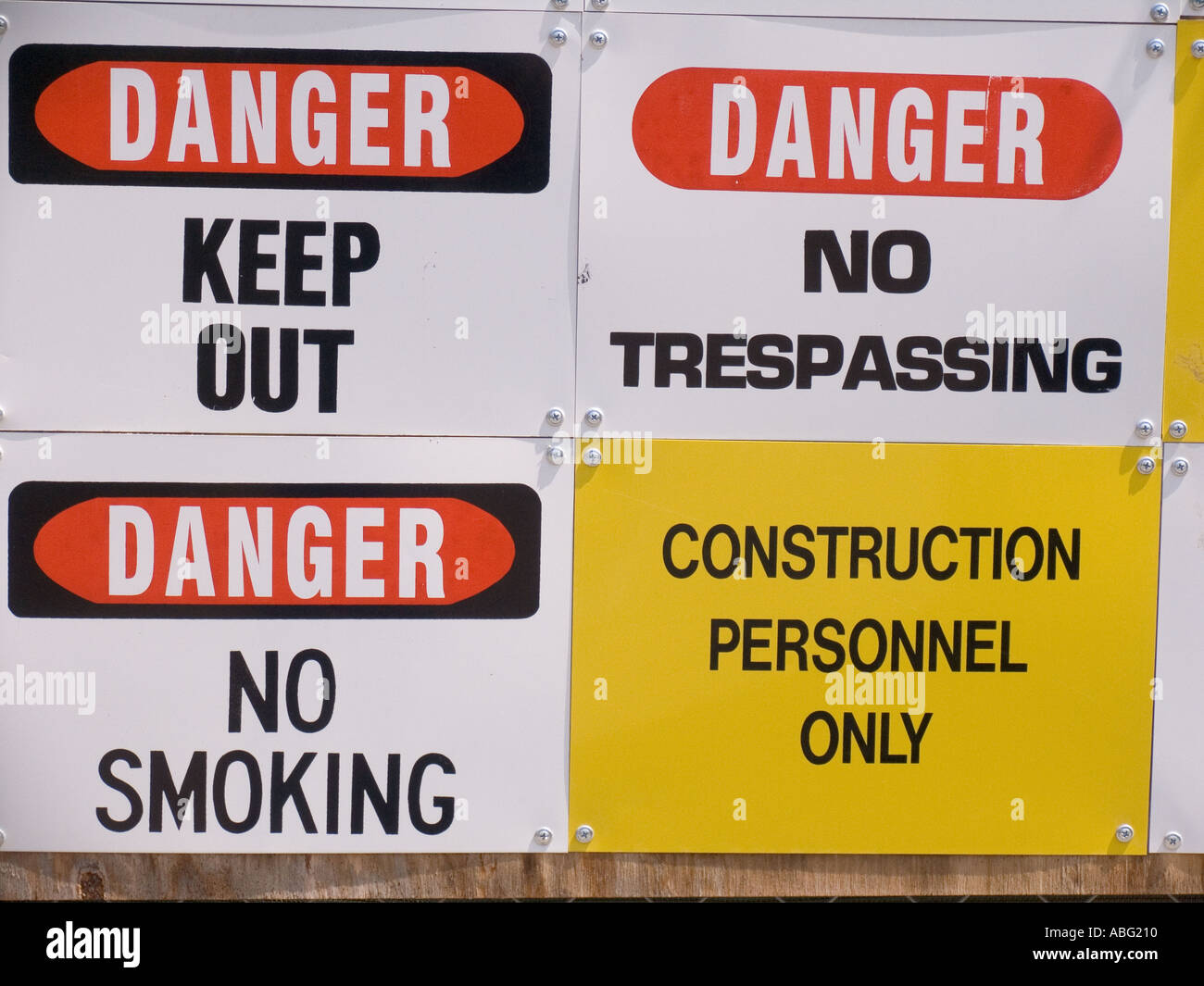 Warning signs at construction site Stock Photo - Alamy