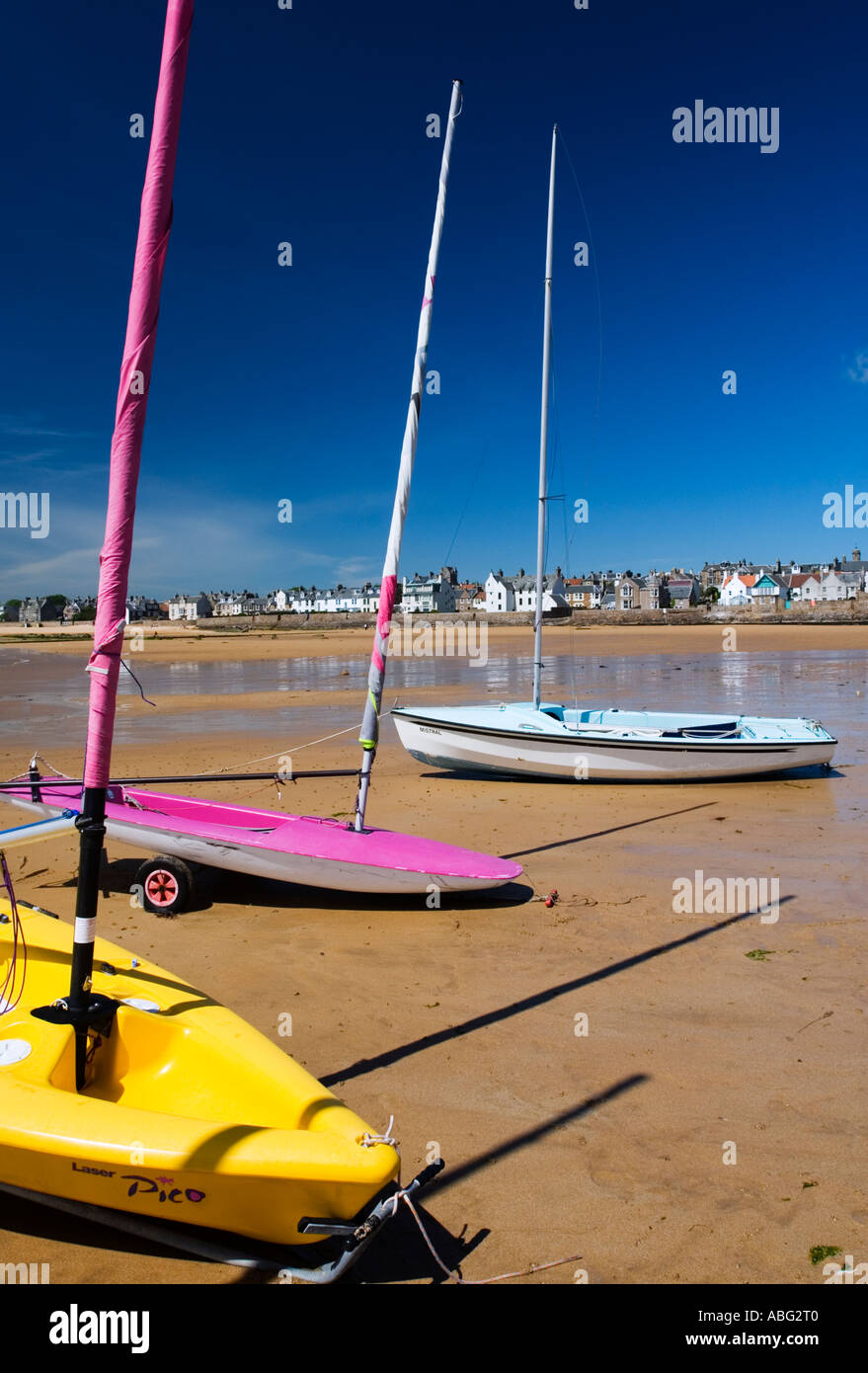Colourful sailing boats on beach at Elie in East Neuk of Fife in ...