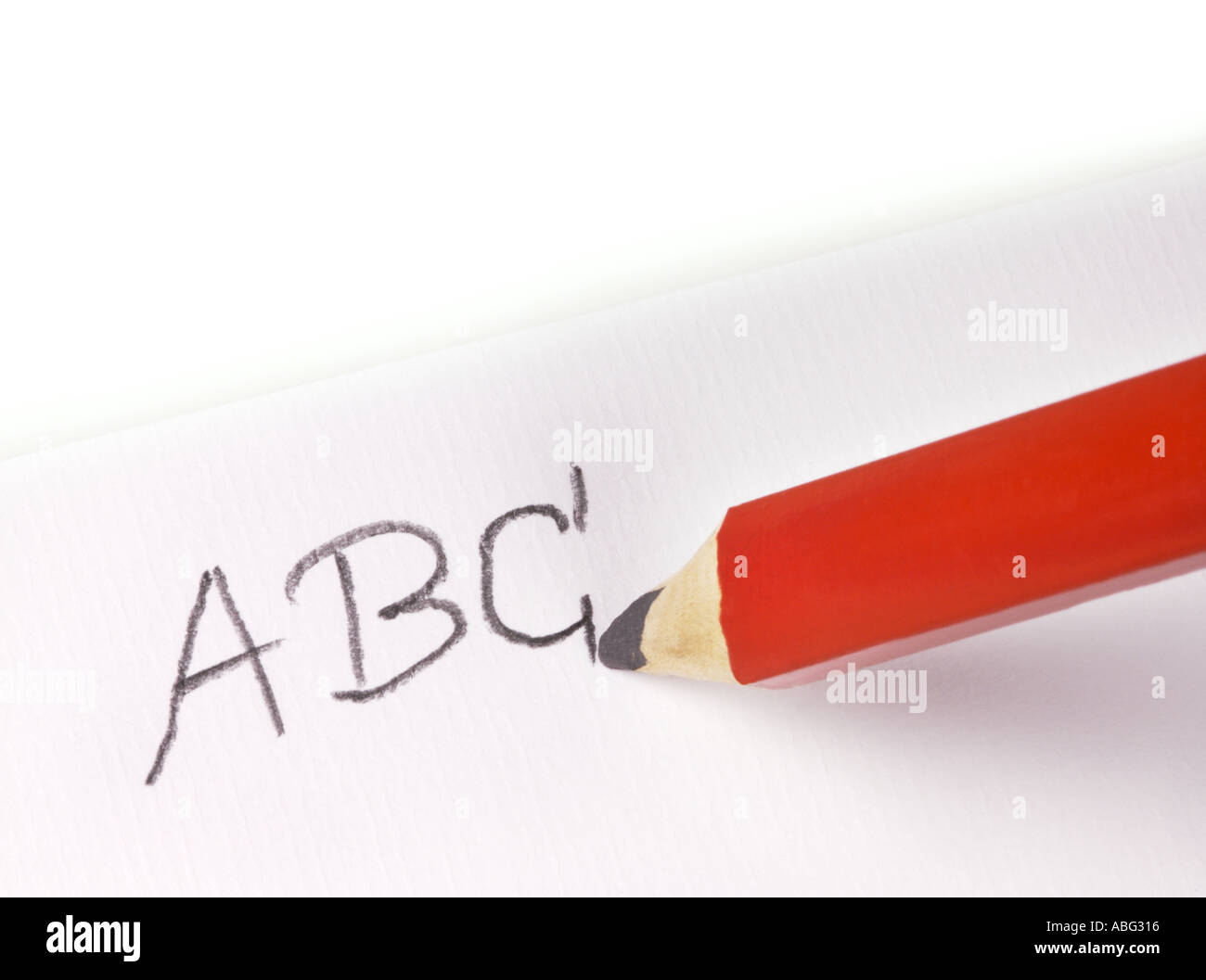 writing drawing with the big red pencil write A B C ABC Stock Photo - Alamy