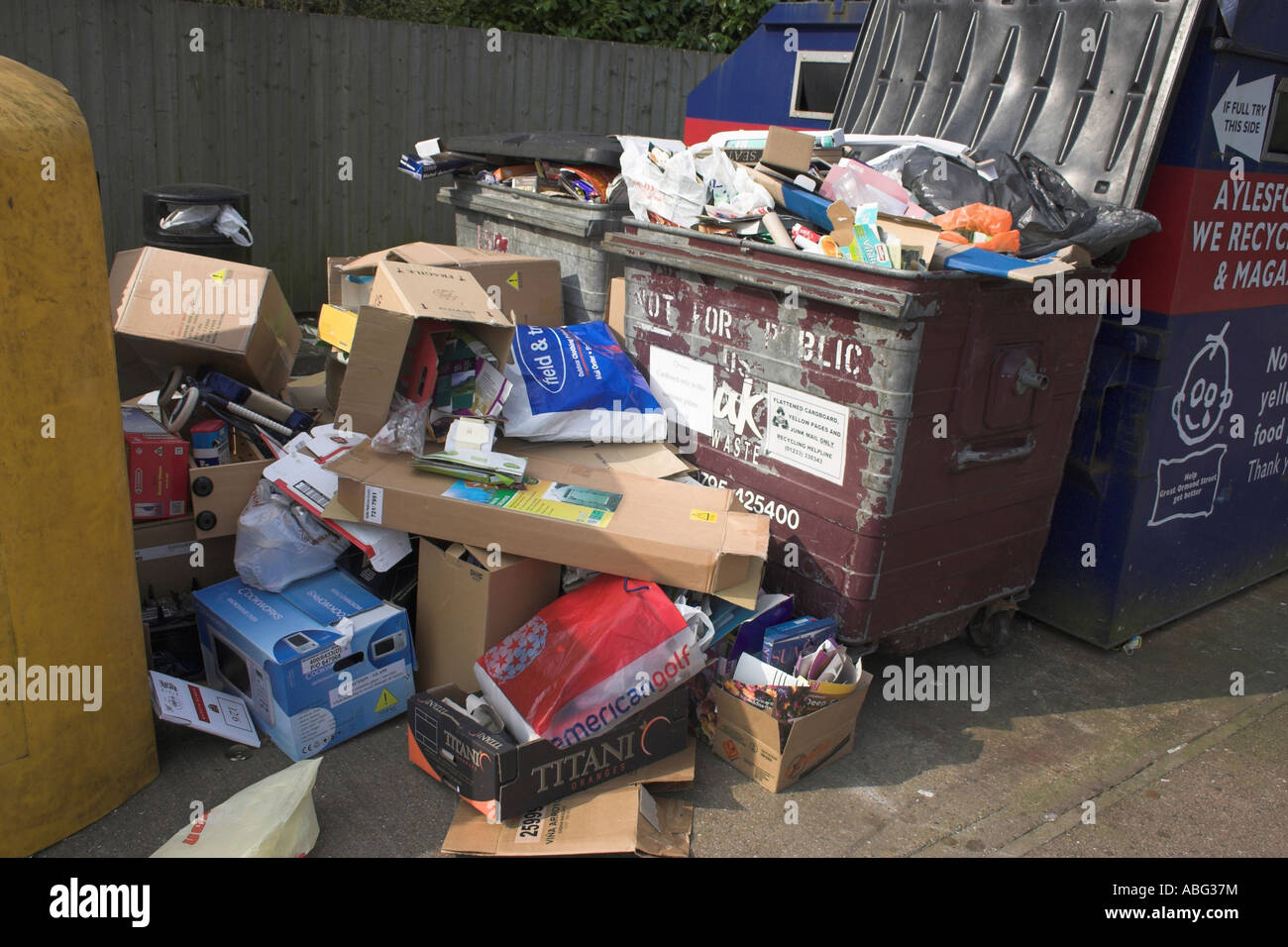 Overflowing Cardboard collection bins at a supermarket Stock Photo - Alamy